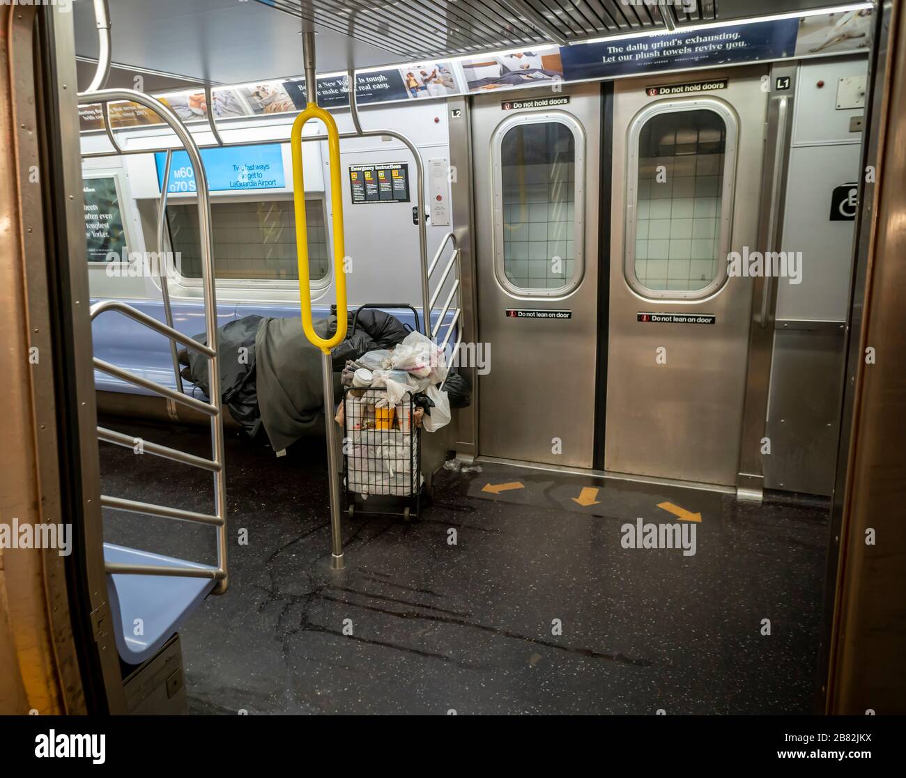 Homeless man sleeping in subway hi-res stock photography and images - Alamy