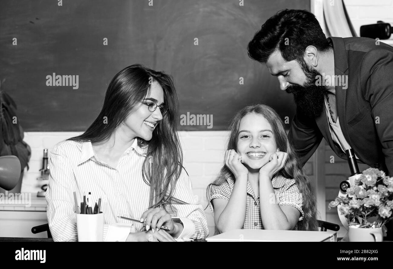 First you start with homework. Parents help daughter with homework ...