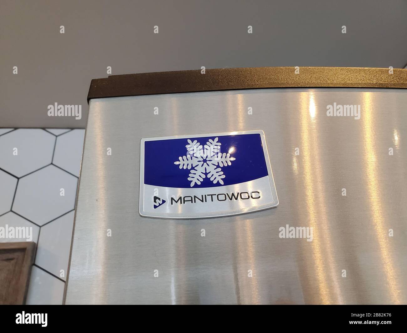 Close-up of logo for Manitowoc restaurant supply company on stainless ...