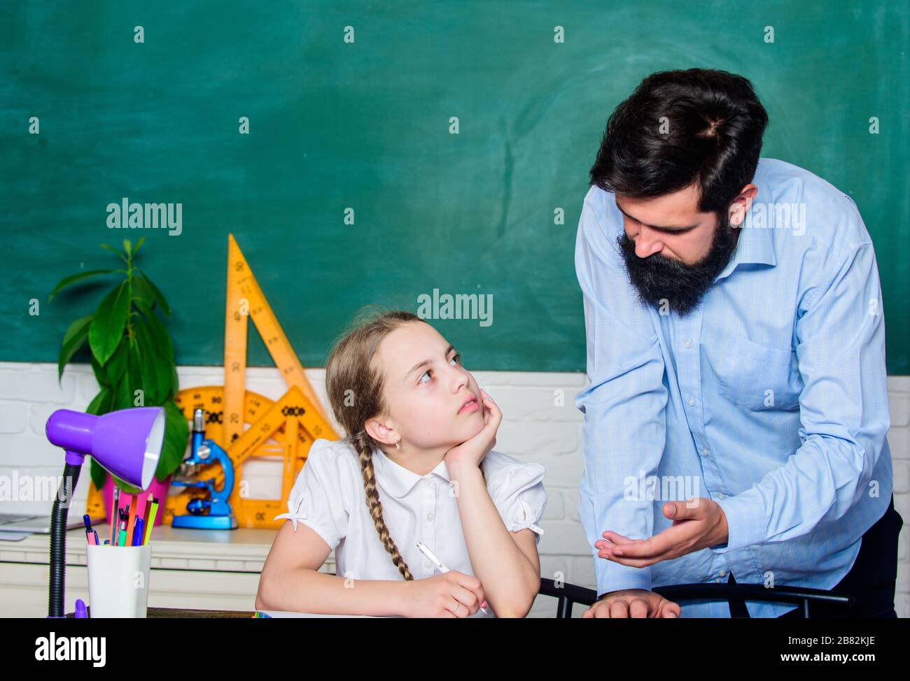 Teacher paperwork with child hi-res stock photography and images - Alamy