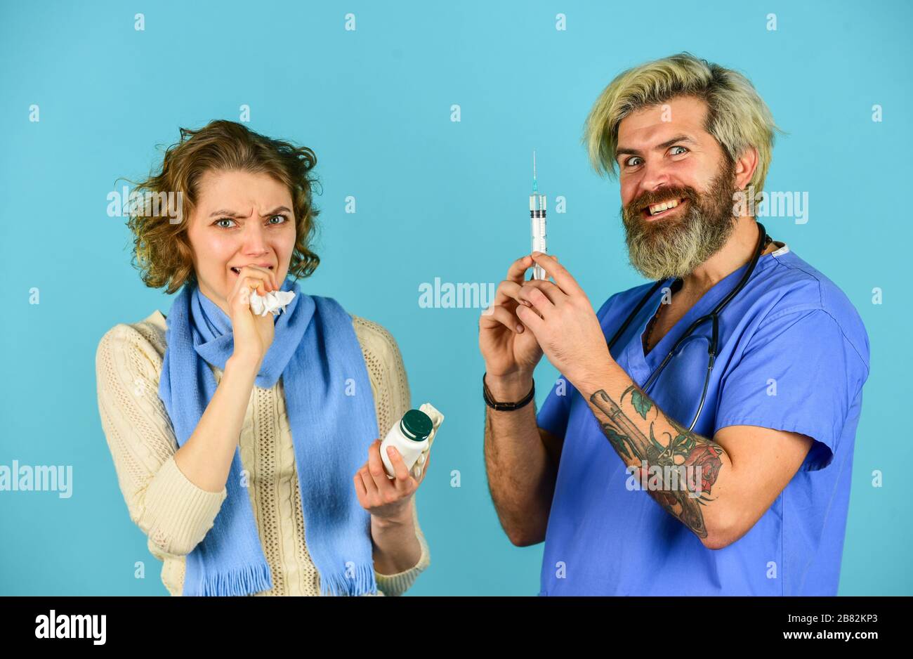 She afraid of needles. doctor and patient meeting at hospital ...