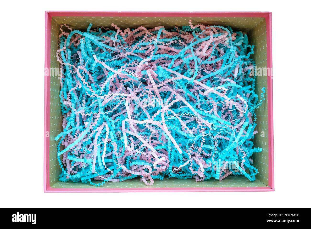 Decorative paper shavings for gift wrapping. Thin wrapping paper lies ...