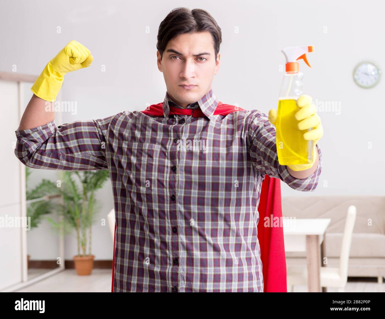 The the super hero cleaner doing housework Stock Photo - Alamy