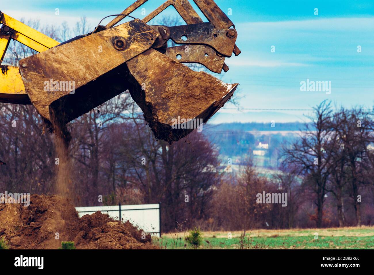 Excavator digging up pavement hi-res stock photography and images - Alamy
