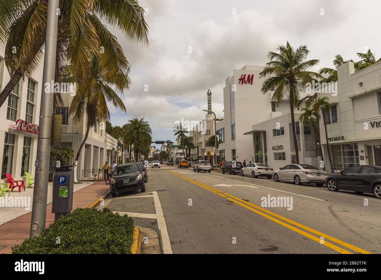 Beautiful landscape view of street of Miami Beach. White buildings and ...