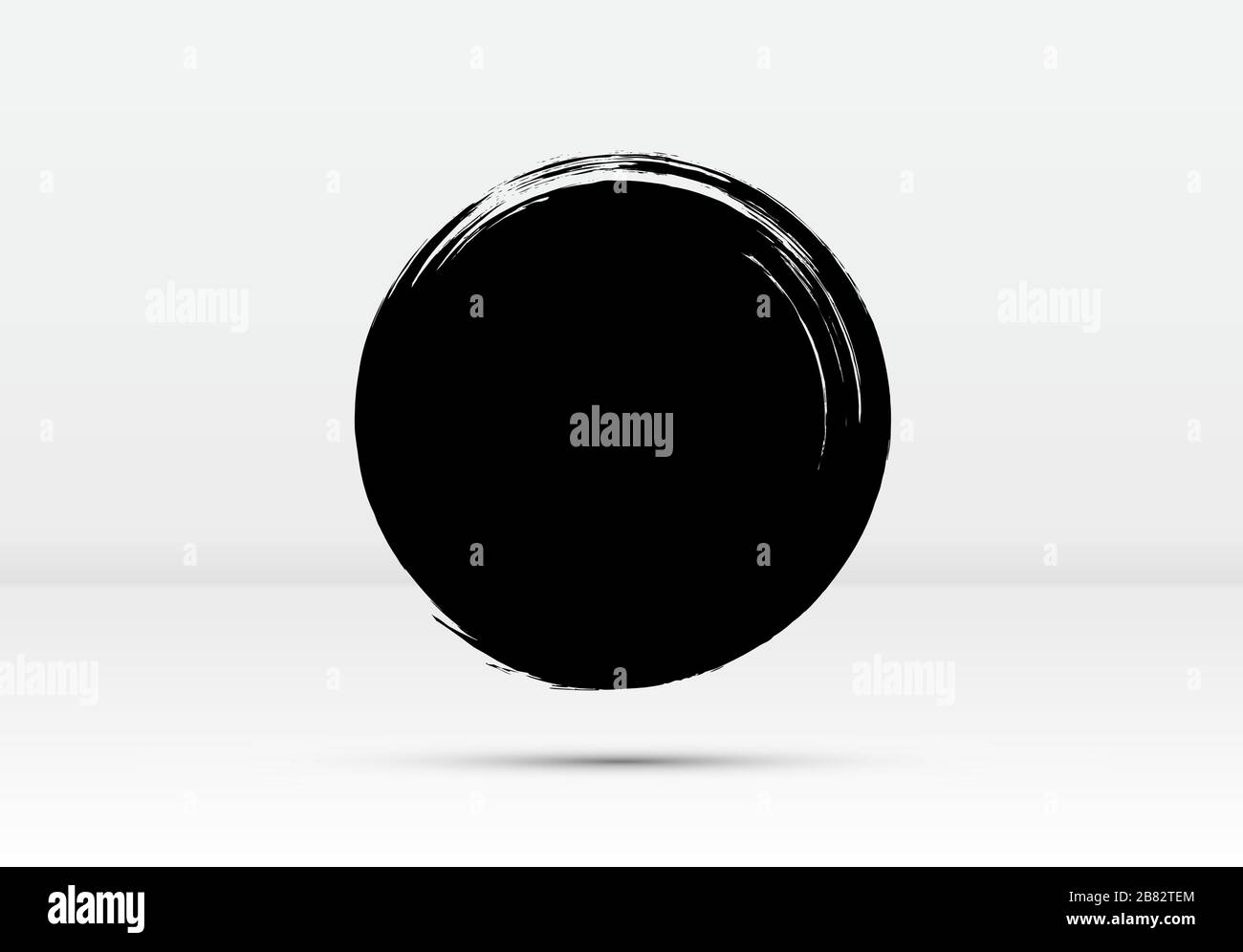 Abstract brushed black ink circle with rough edges and grungy texture ...