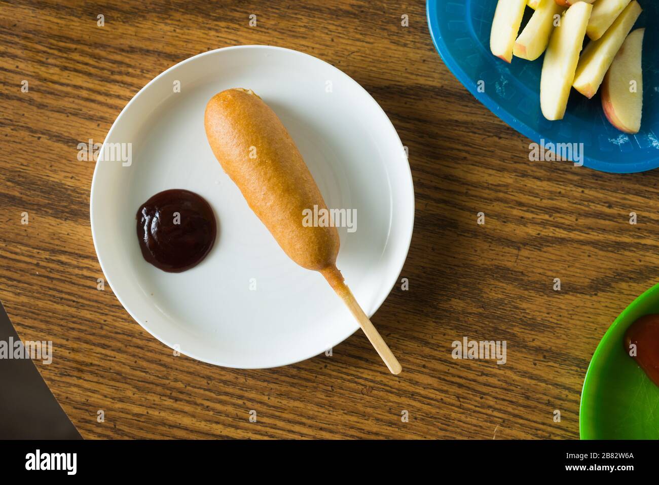 Kid eating hot dog hi-res stock photography and images - Alamy