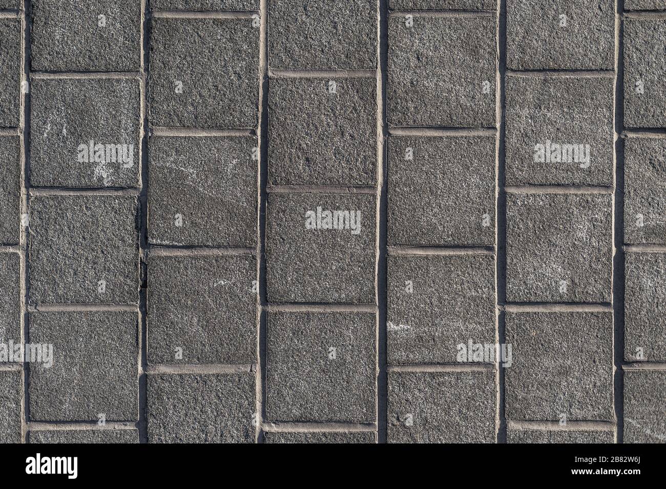 Square, textured, grey cobblestone sidewalk in clean even lines Stock ...