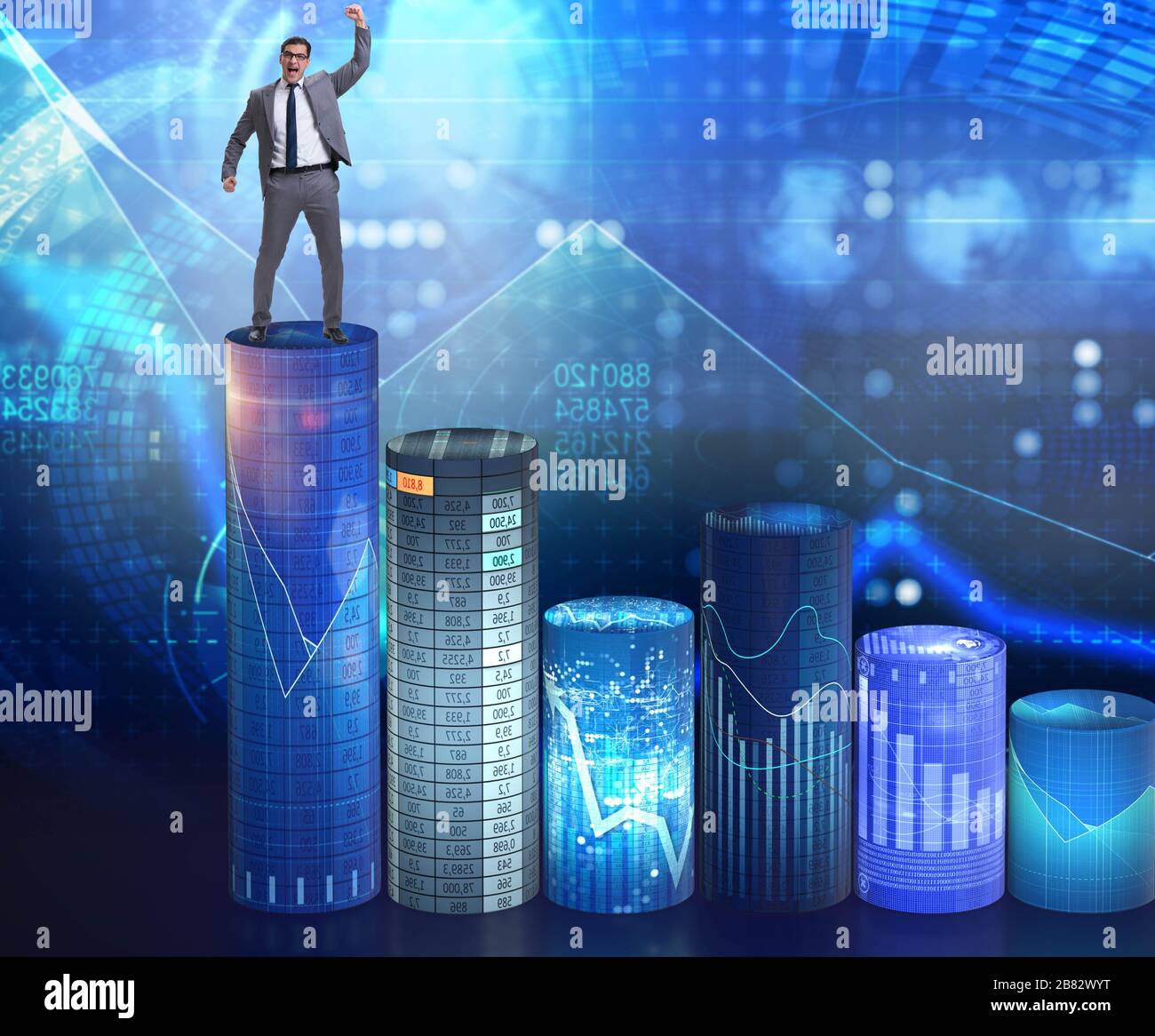 The businessman on the bar charts in business concept Stock Photo - Alamy