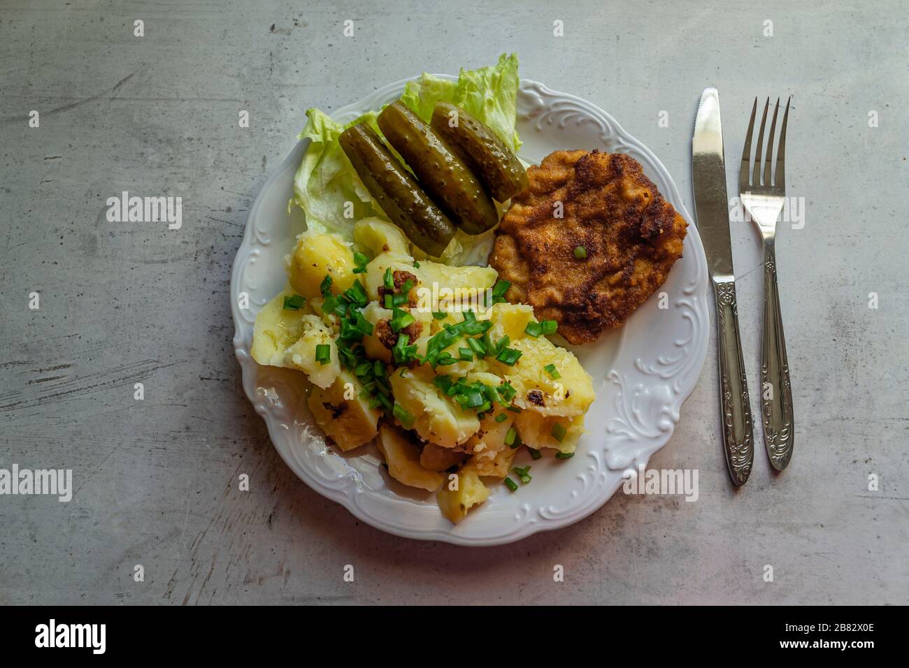 Cutlet with potatoes as the main dinner dish Stock Photo - Alamy
