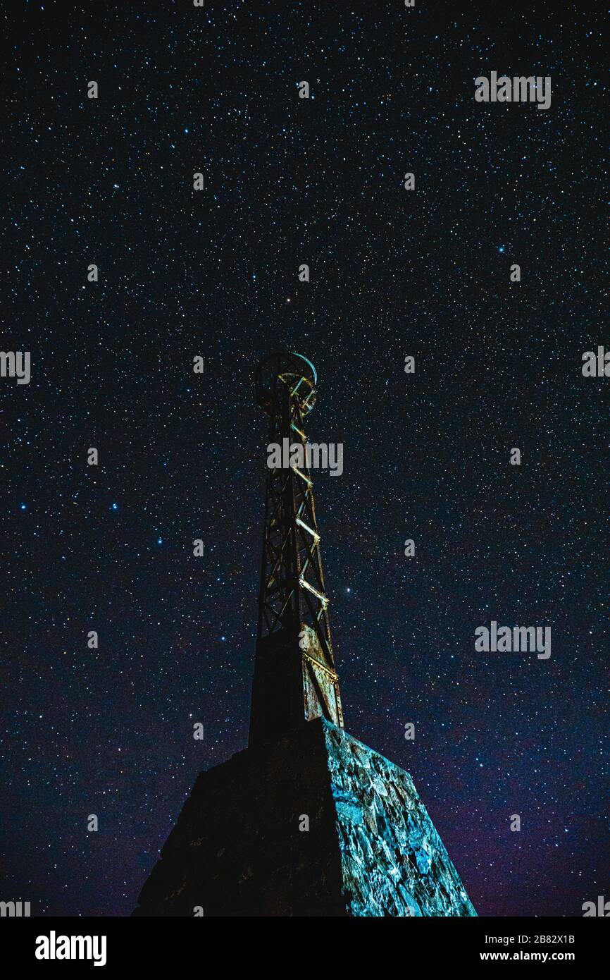 Starry night lighthouse. Milky way core visible Stock Photo - Alamy