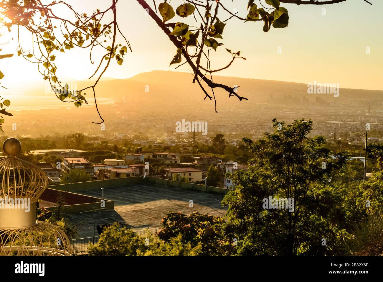 Landscape aerial view of the city of Naples and its gulf at sunset time ...