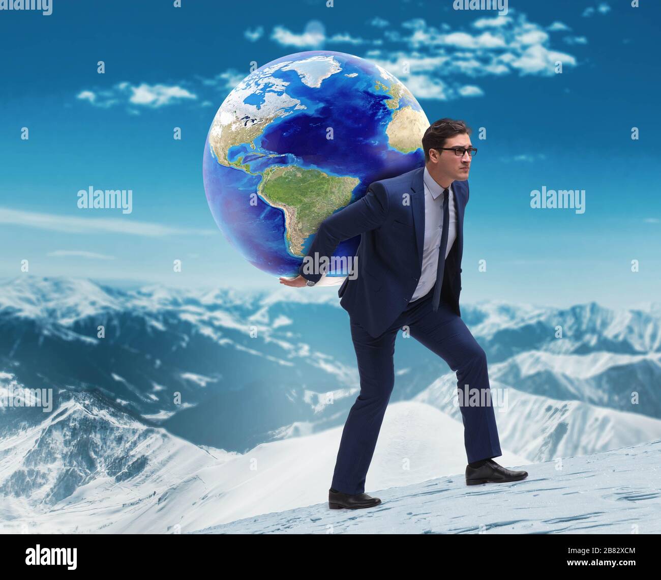 The businessman carrying earth on his shoulders Stock Photo - Alamy