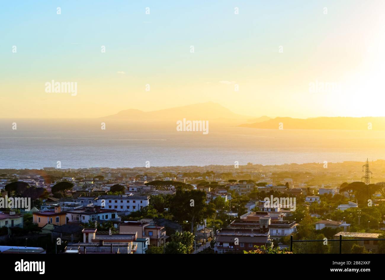 Landscape aerial view of the city of Naples and its gulf at sunset time ...