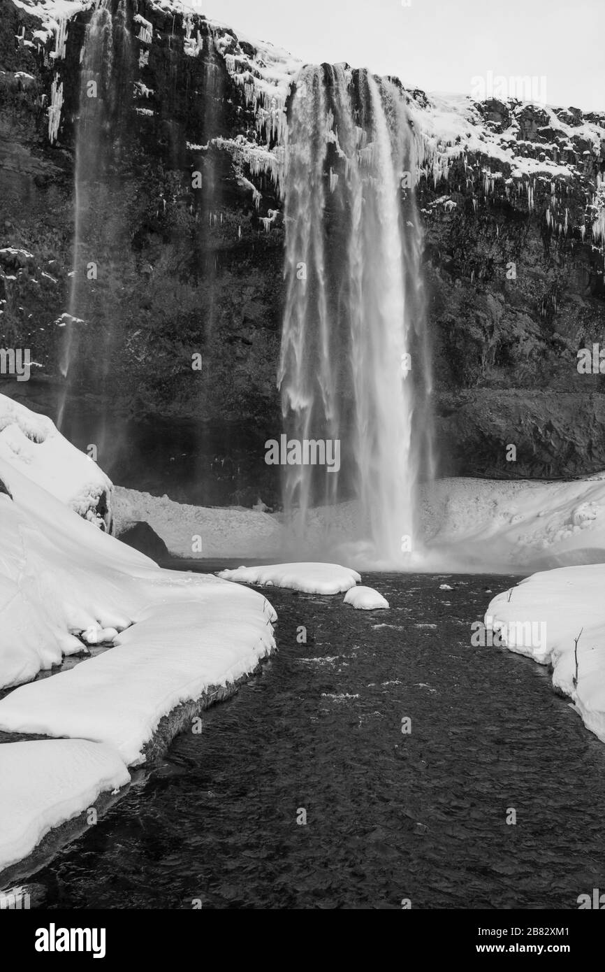 waterfall falls to the ground in icelandic wilderness Stock Photo - Alamy