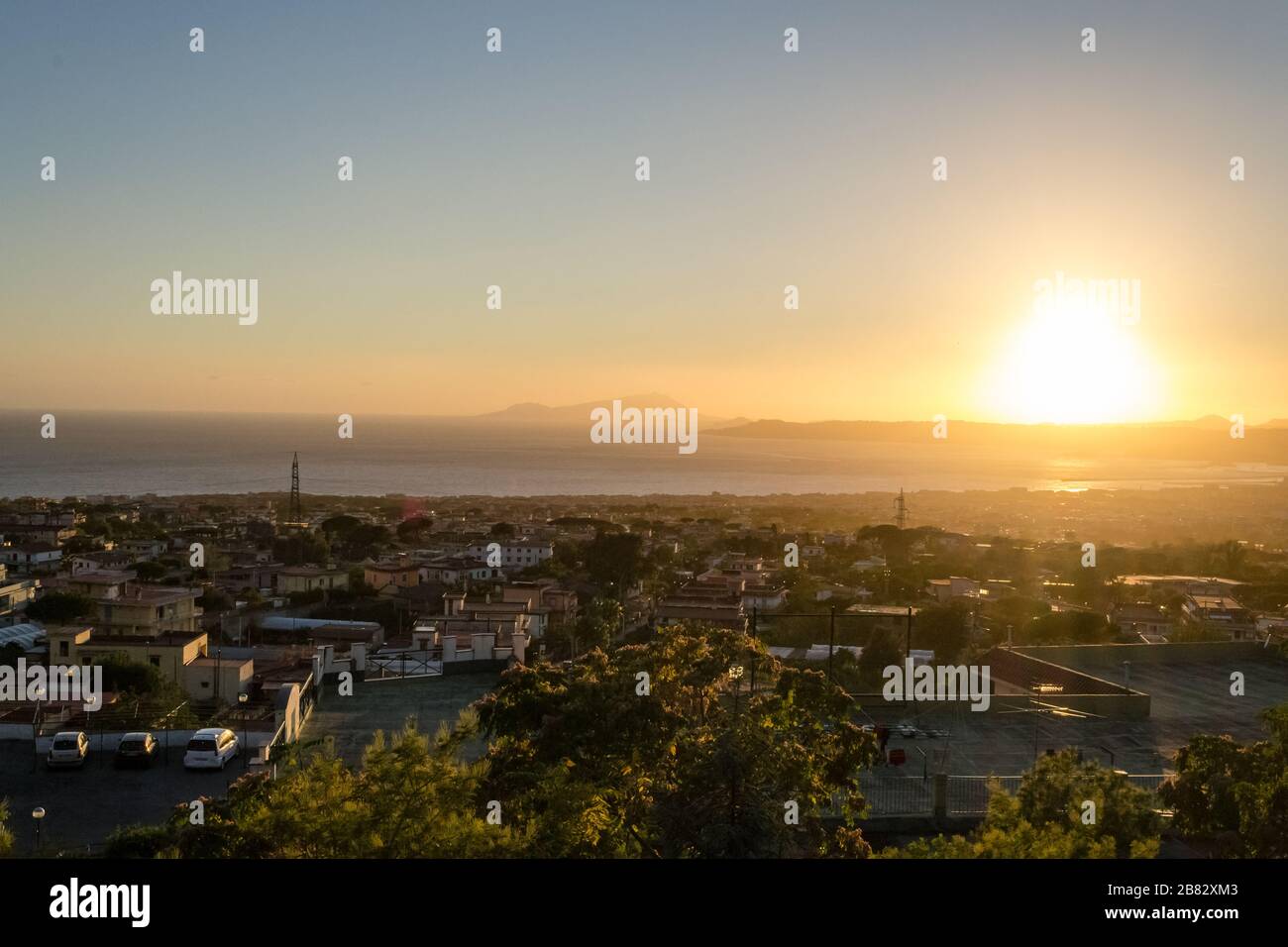 Landscape aerial view of the city of Naples and its gulf at sunset time ...