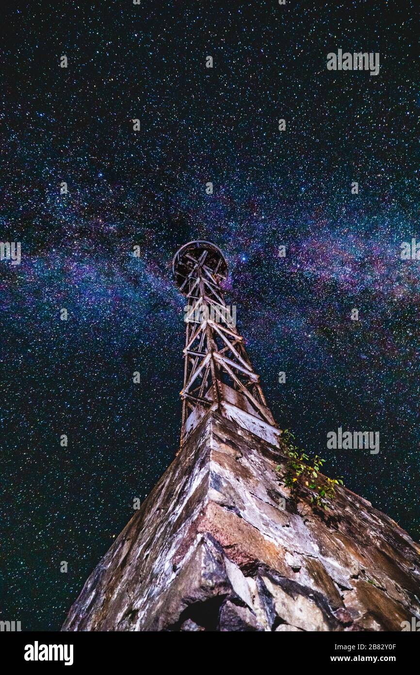 Starry night lighthouse. Milky way core visible Stock Photo - Alamy