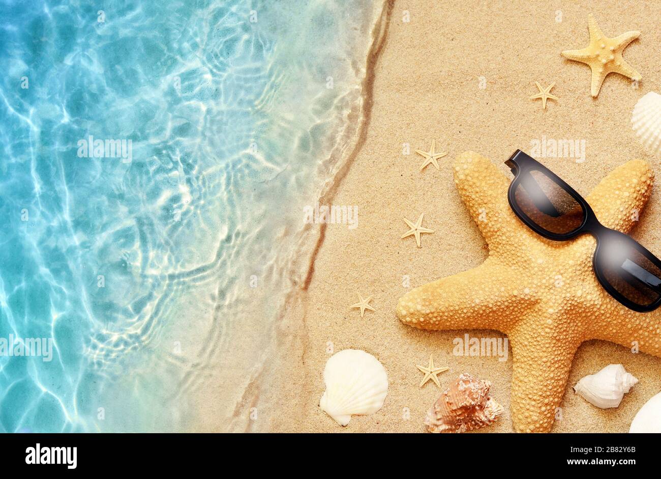 Summer sand beach background. Starfish in sunglasses and sea. Summer ...