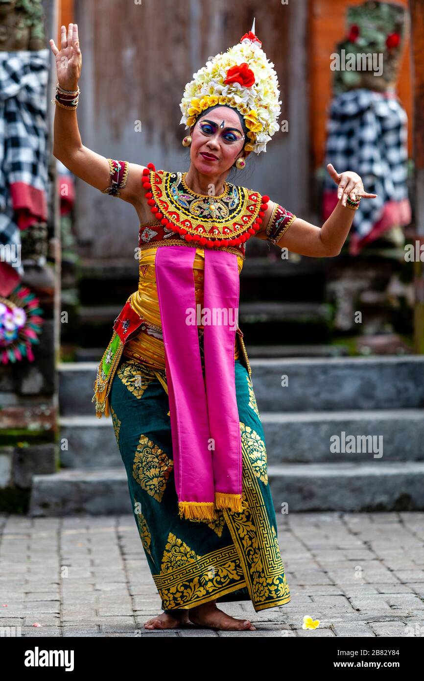 A Female Performer Dancing During A Traditional Balinese Barong and ...