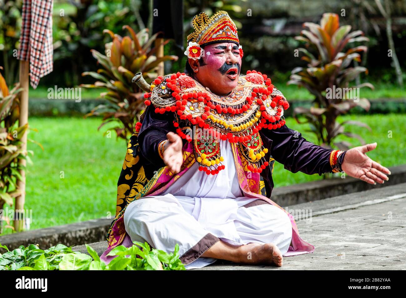 A Male Performer In Costume Performs During A Traditional Balinese ...
