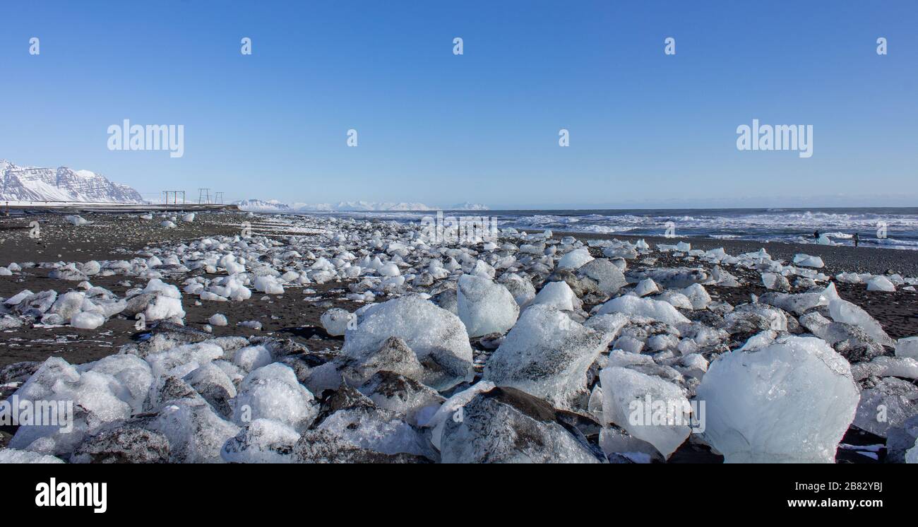 ice fields at the black pebble beach, coast of iceland Stock Photo - Alamy