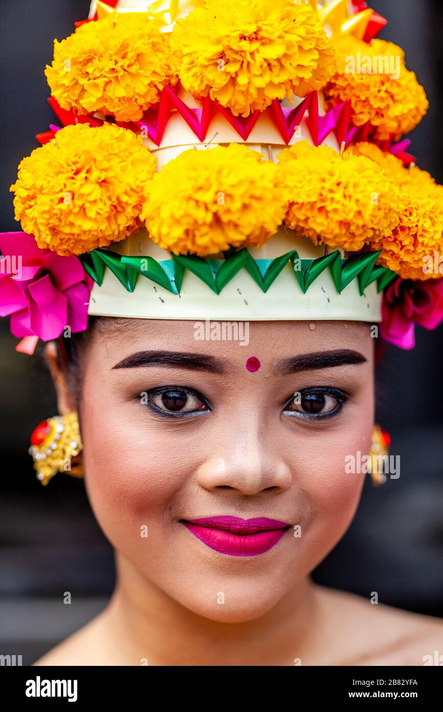 A Young Balinese Hindu Female In Festival Costume At The Batara Turun ...