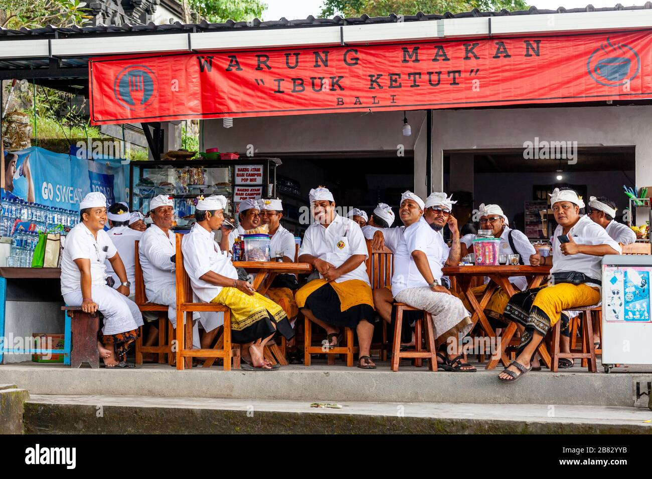 A Group Of Balinese Hindu Men Sitting At A Restaurant, Besakih Temple ...
