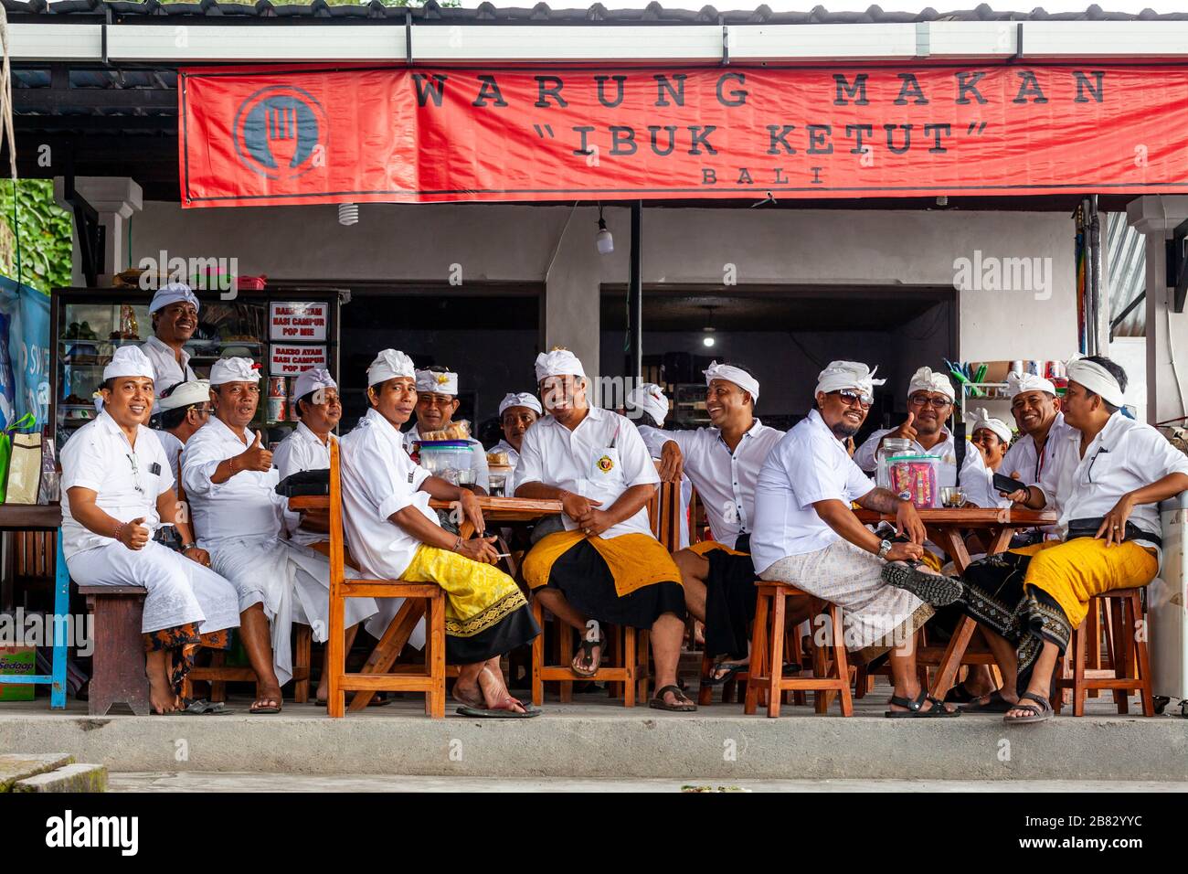 A Group Of Balinese Hindu Men Sitting At A Restaurant, Besakih Temple ...