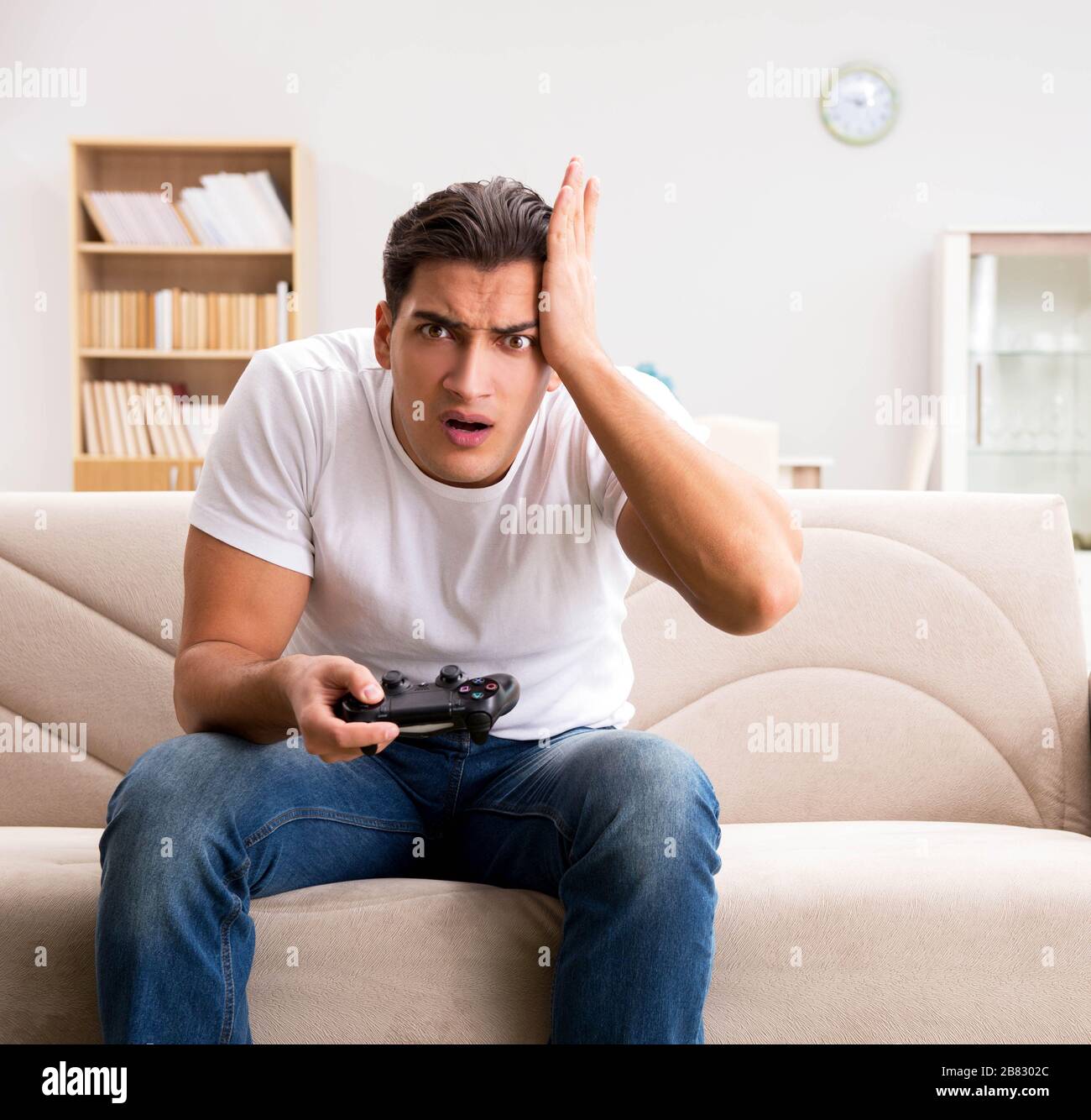 The man addicted to computer games Stock Photo - Alamy