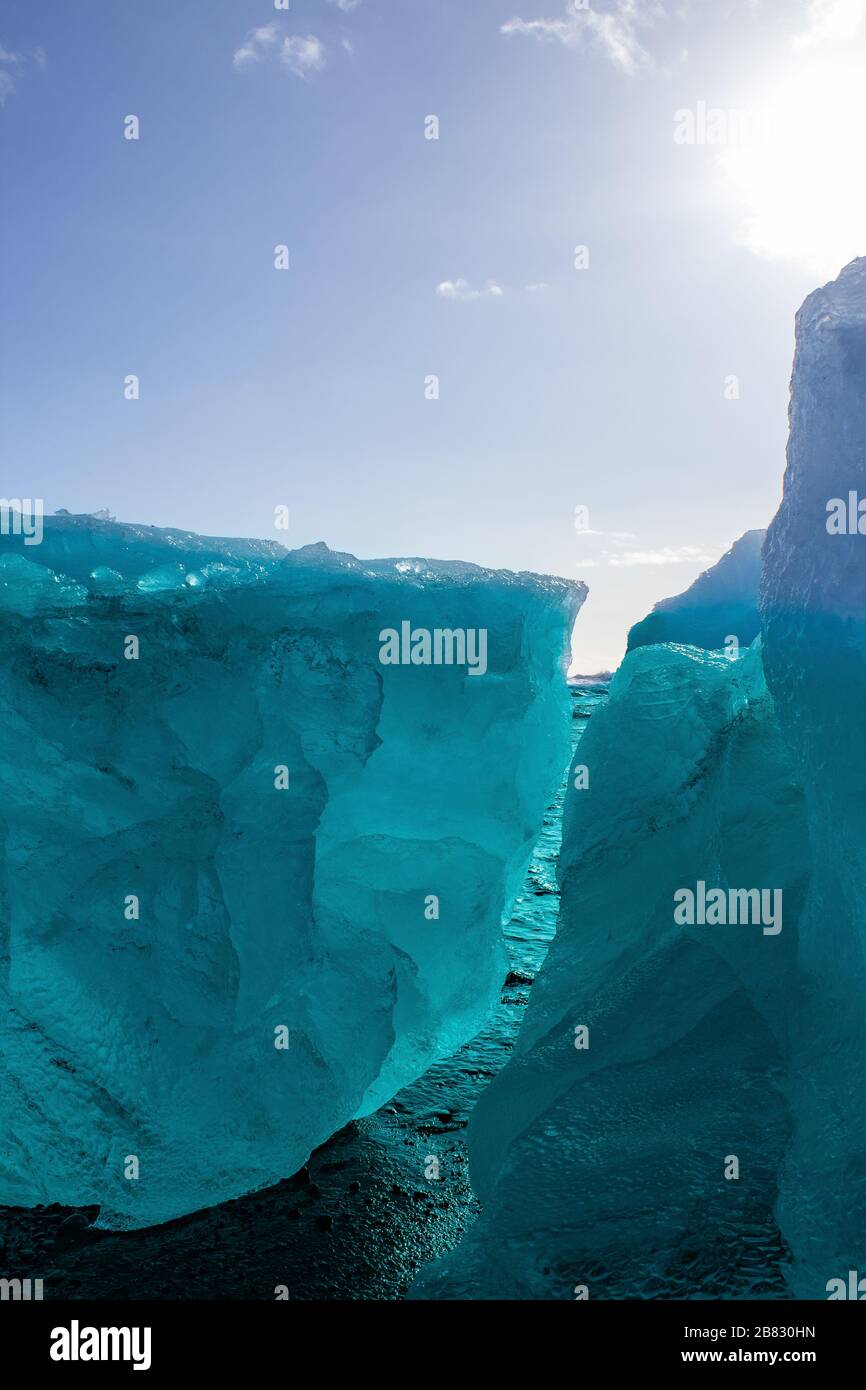 ice fields at the black pebble beach, coast of iceland Stock Photo - Alamy