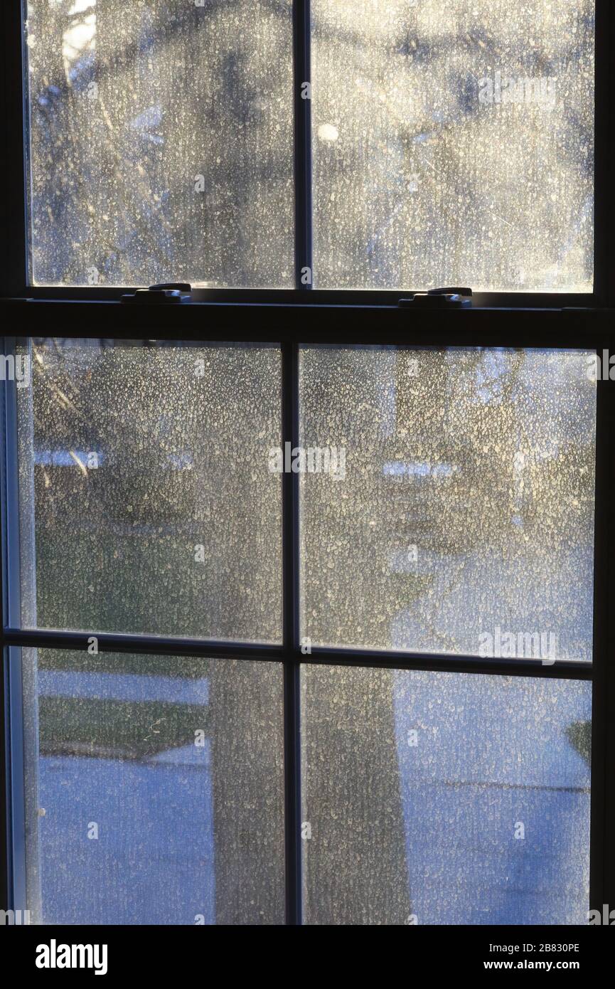 Glass window covered in dirt Stock Photo - Alamy