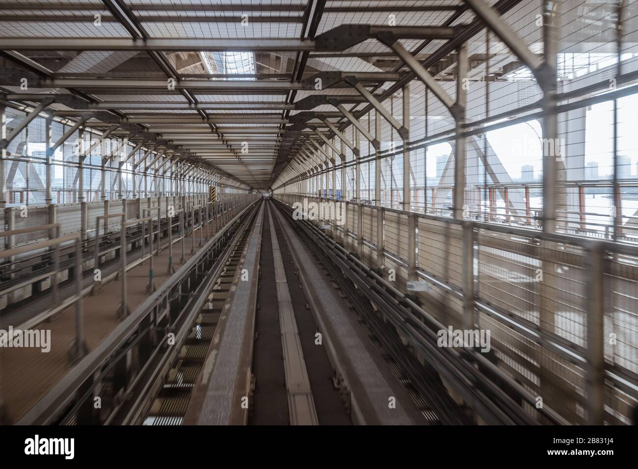 tunnel of monorail road view from front window of a moving train ...