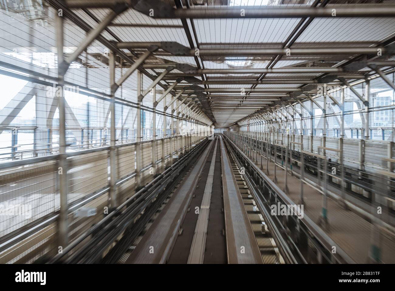 tunnel of monorail road view from front window of a moving train ...