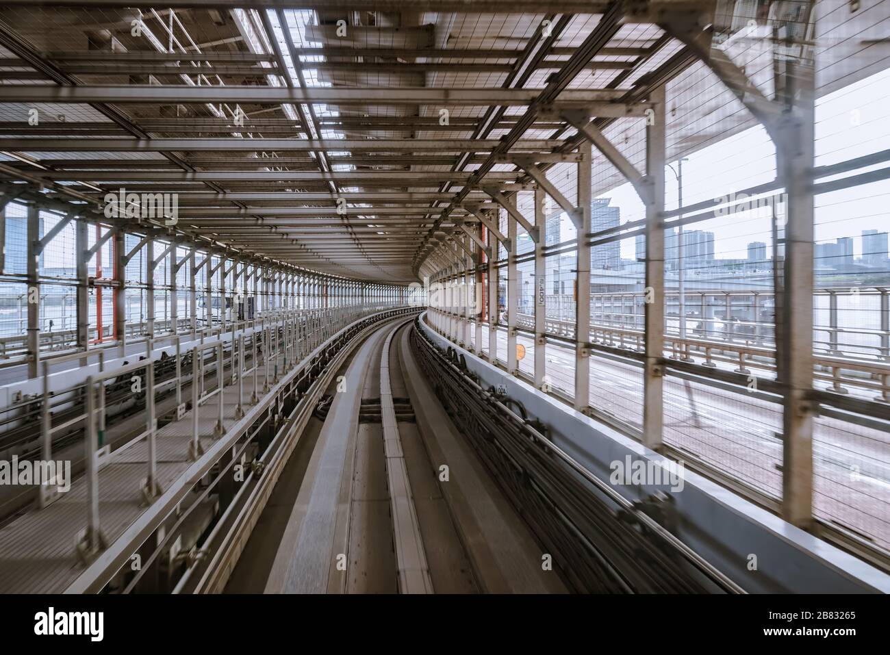 tunnel of monorail road view from front window of a moving train ...
