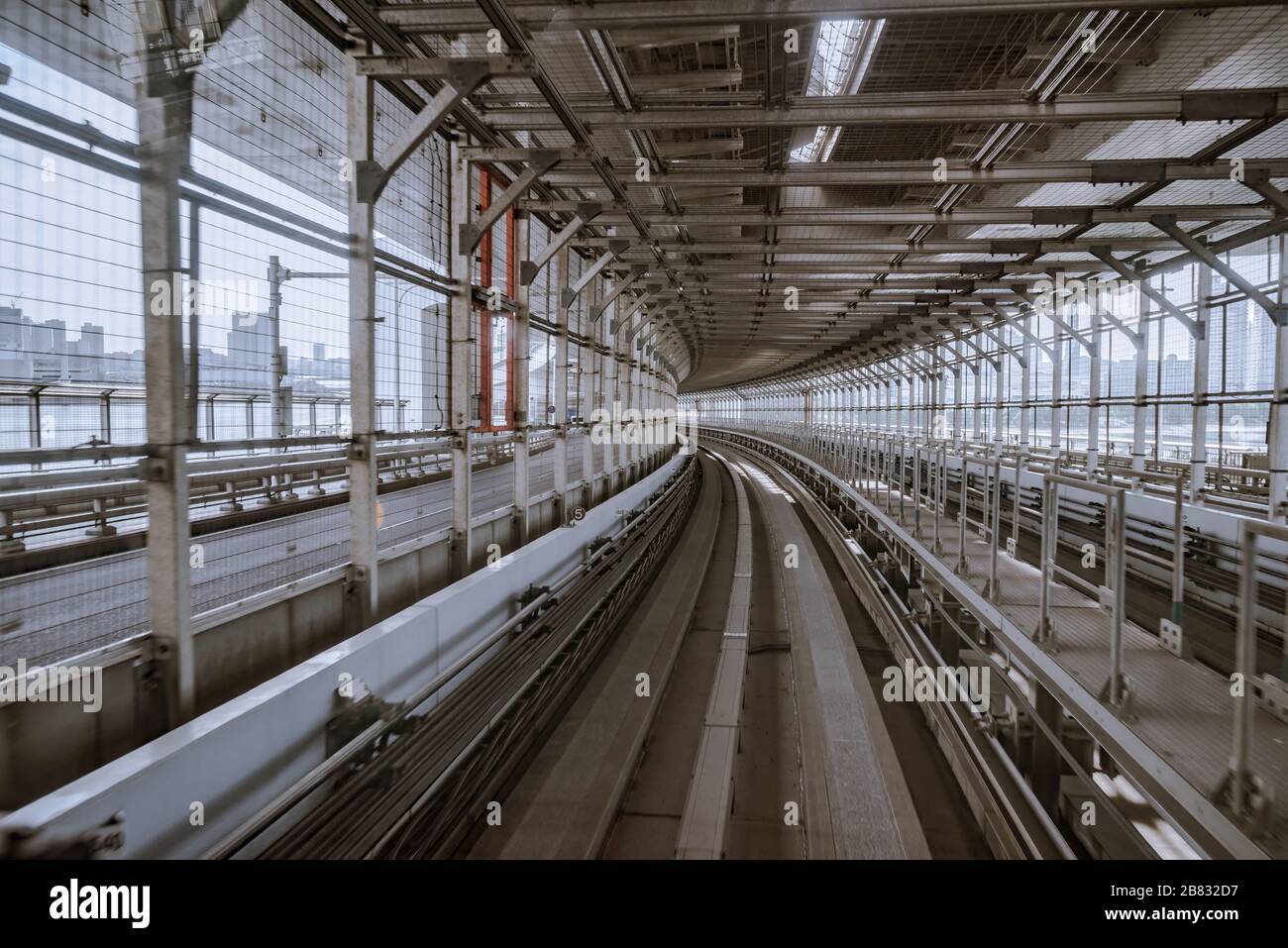 tunnel of monorail road view from front window of a moving train ...