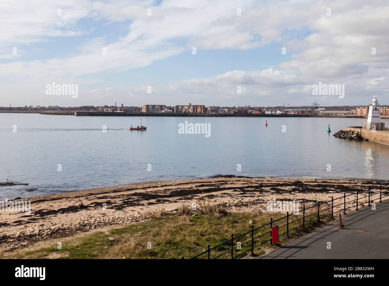 A boat going towards the harbour entrance at the Headland,Hartlepool ...