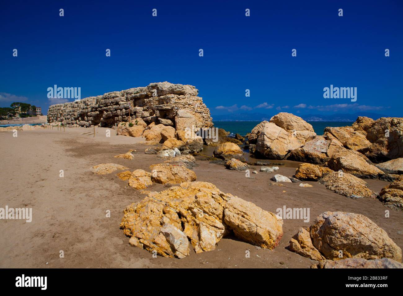 The beach of the Escala village in Costa Brava, Girona, Spain Stock ...