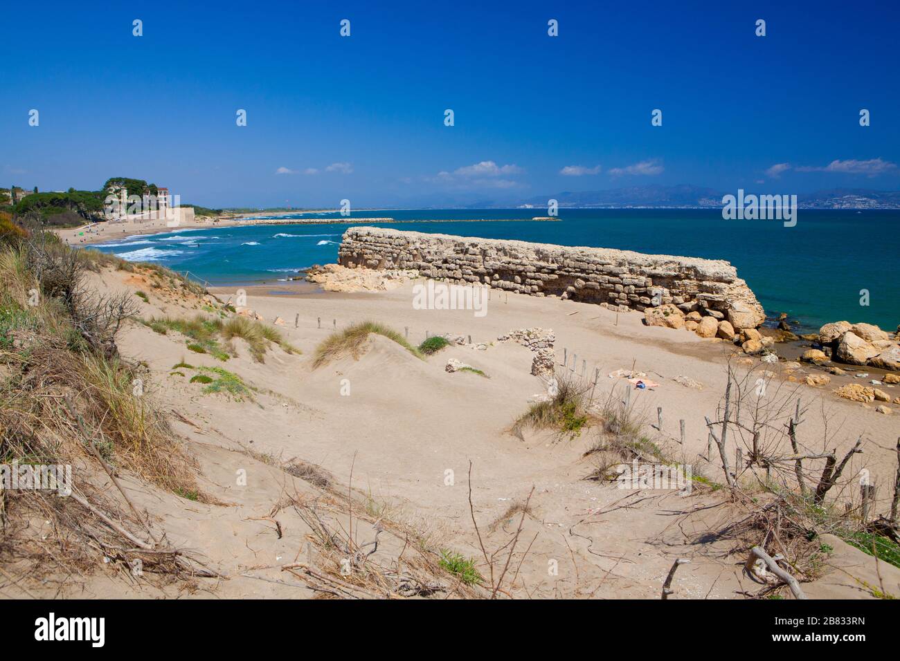 The beach of the Escala village in Costa Brava, Girona, Spain Stock ...