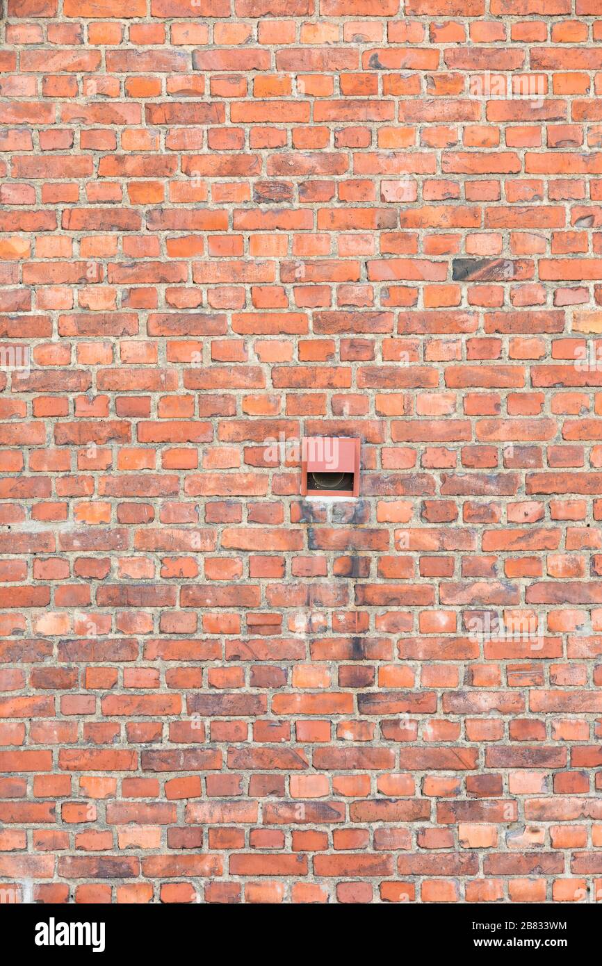 Old messy brick wall texture background exterior Stock Photo - Alamy