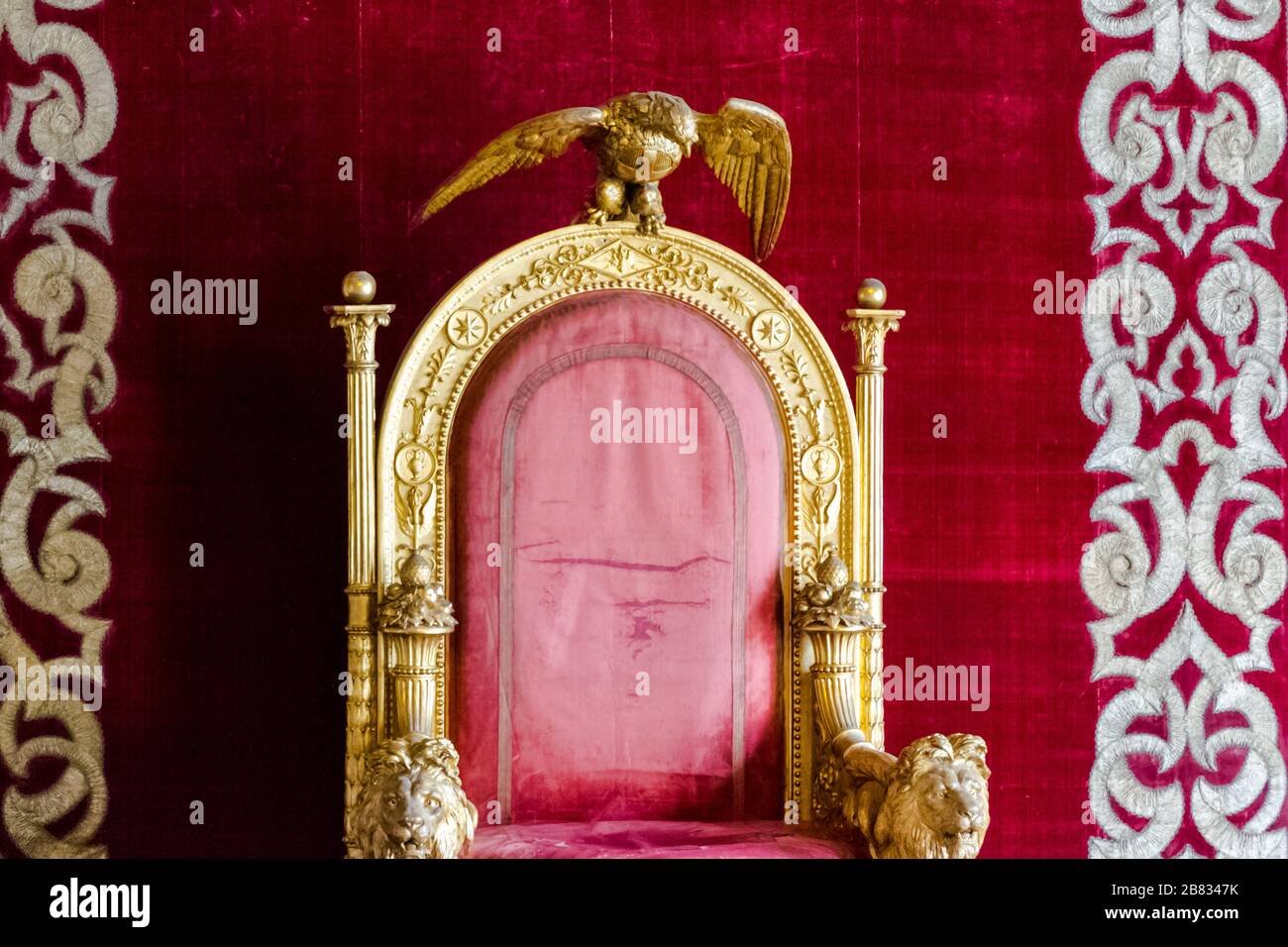 Royal Palace of Naples, Italy, september 2017. The old red and gold ...