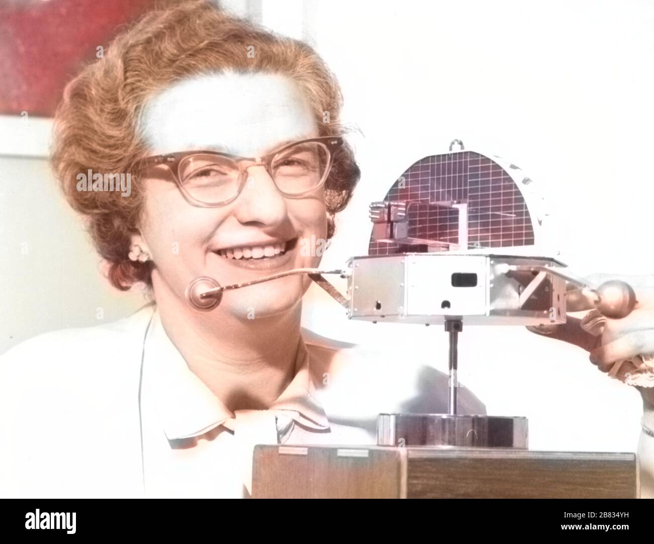Dr Nancy Roman with a model of the Orbiting Solar Observatory (OSO), an ...