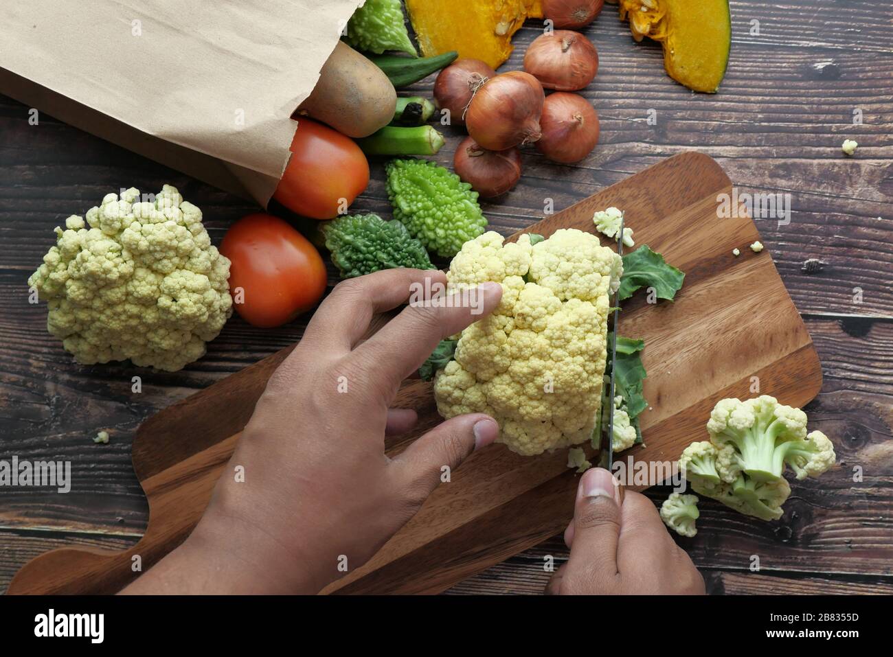 Black man chopping vegetables hi-res stock photography and images - Alamy