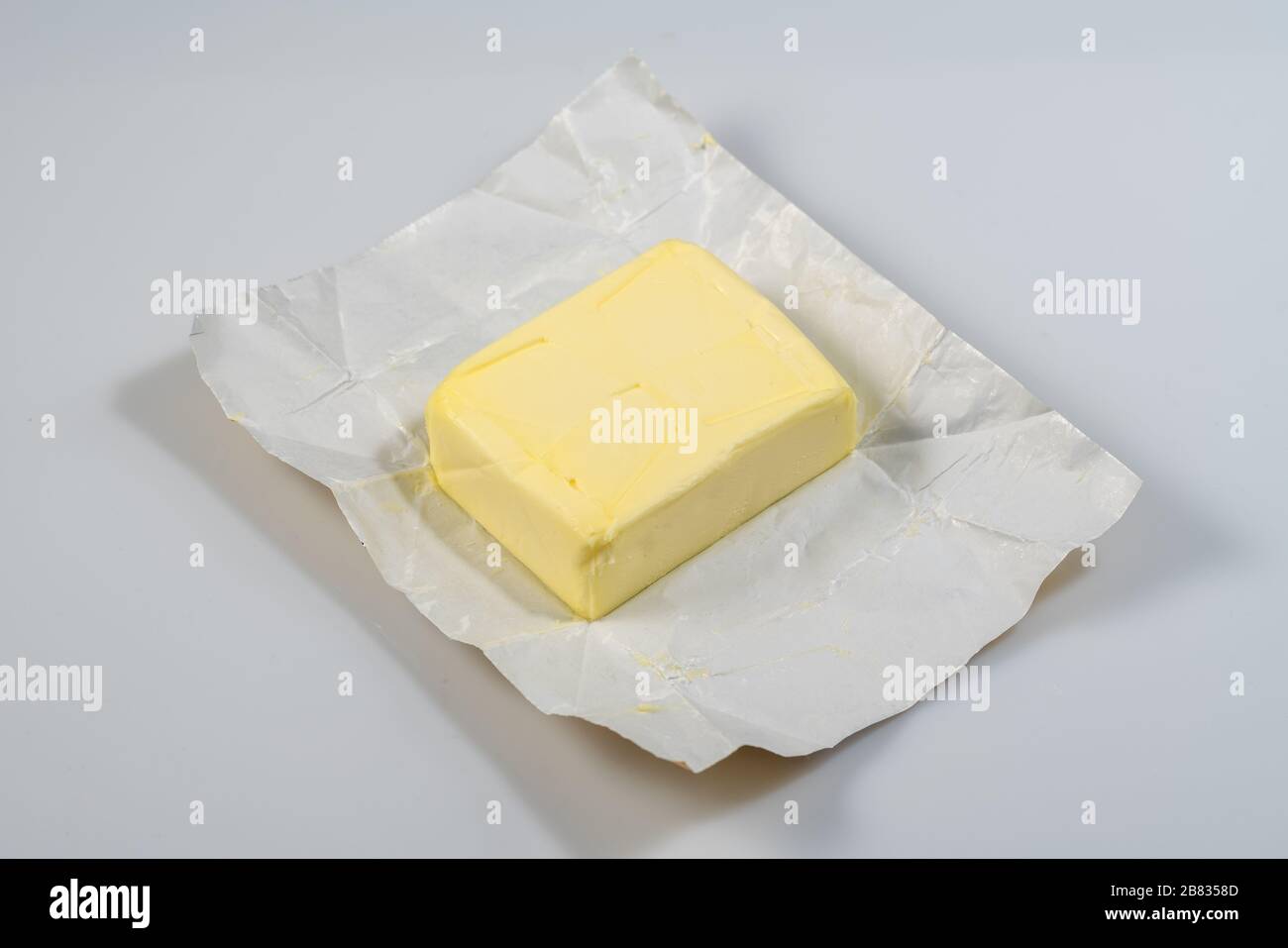 The wrapped butter is open for proper nutrition with amino acids for ...