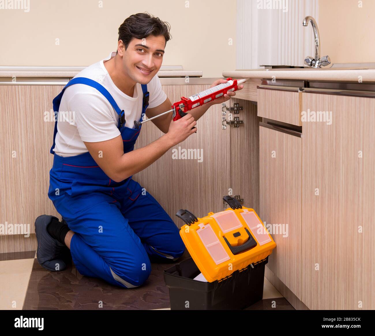 Kitchen sink sealing hi-res stock photography and images - Alamy