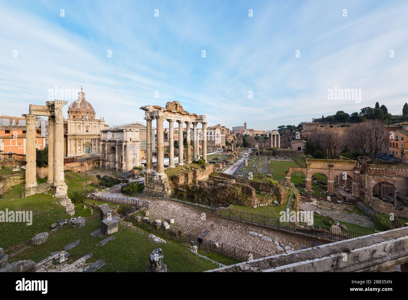 Cityscape of the Roman Forum ruins with the Arch of Severus, temple of ...