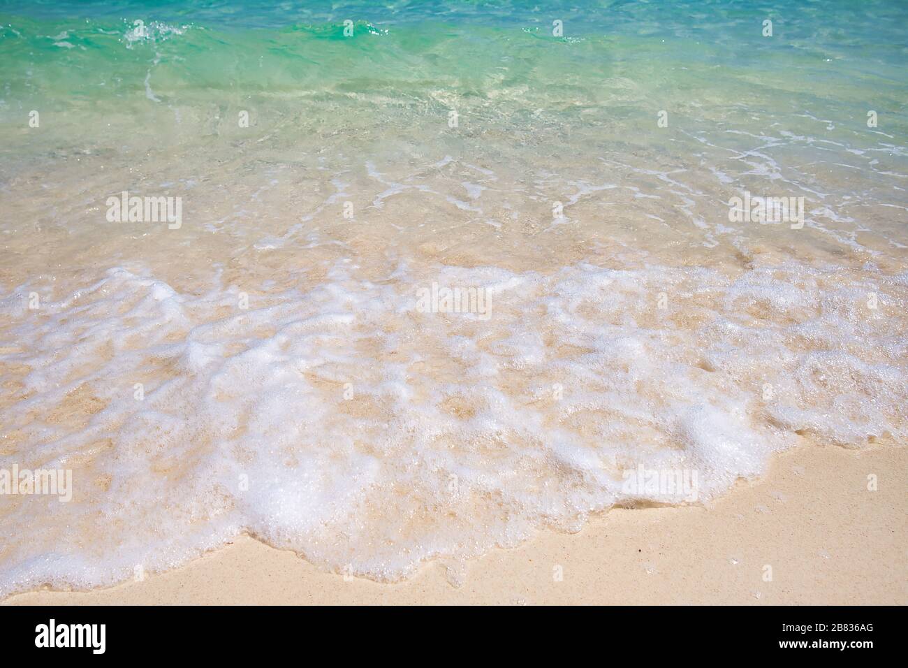 Water touching sand hi-res stock photography and images - Alamy
