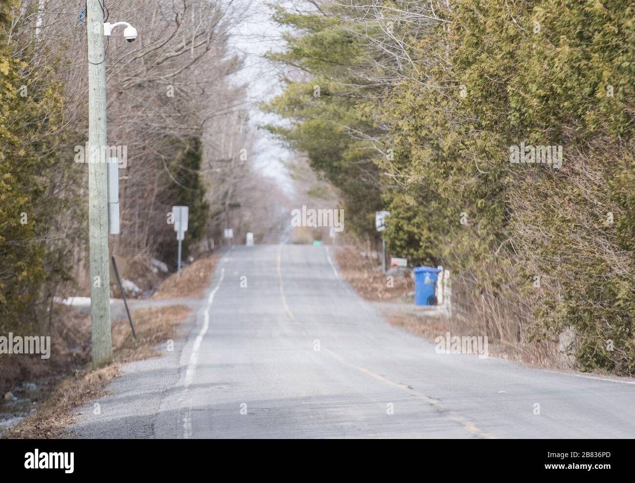 A security camera is shown next to an irregular border crossing at ...