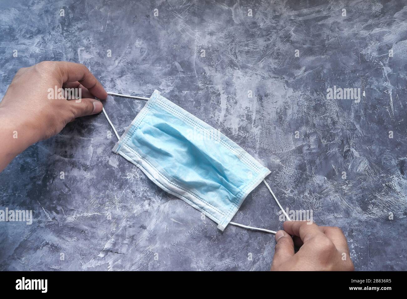top view of face mask on black background with copy space Stock Photo ...