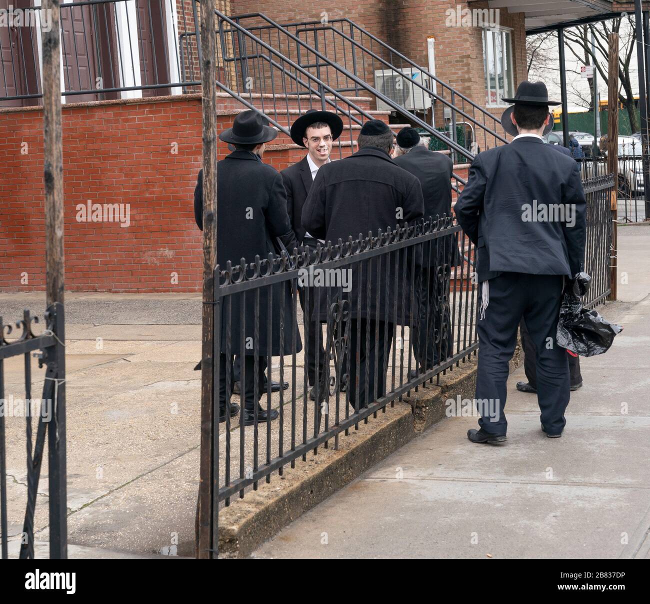 New York, NY - March 19, 2020: Hasidic Jewish students gather at the ...