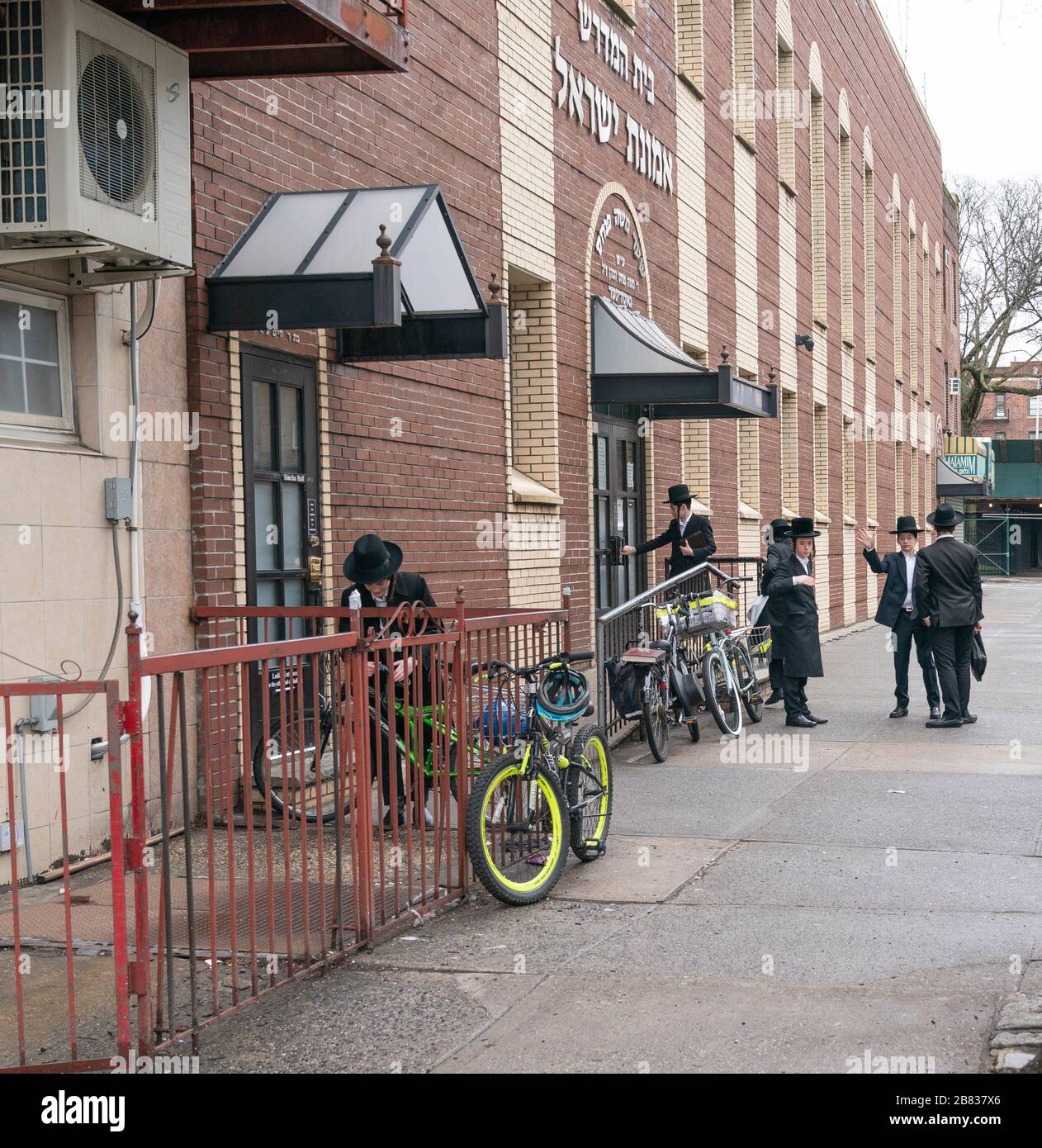 New York, NY - March 19, 2020: Hasidic Jewish students gather at the ...